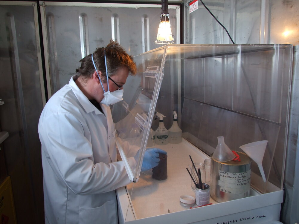 2006 Conservator Robert Clendon treating an artefact in the ...