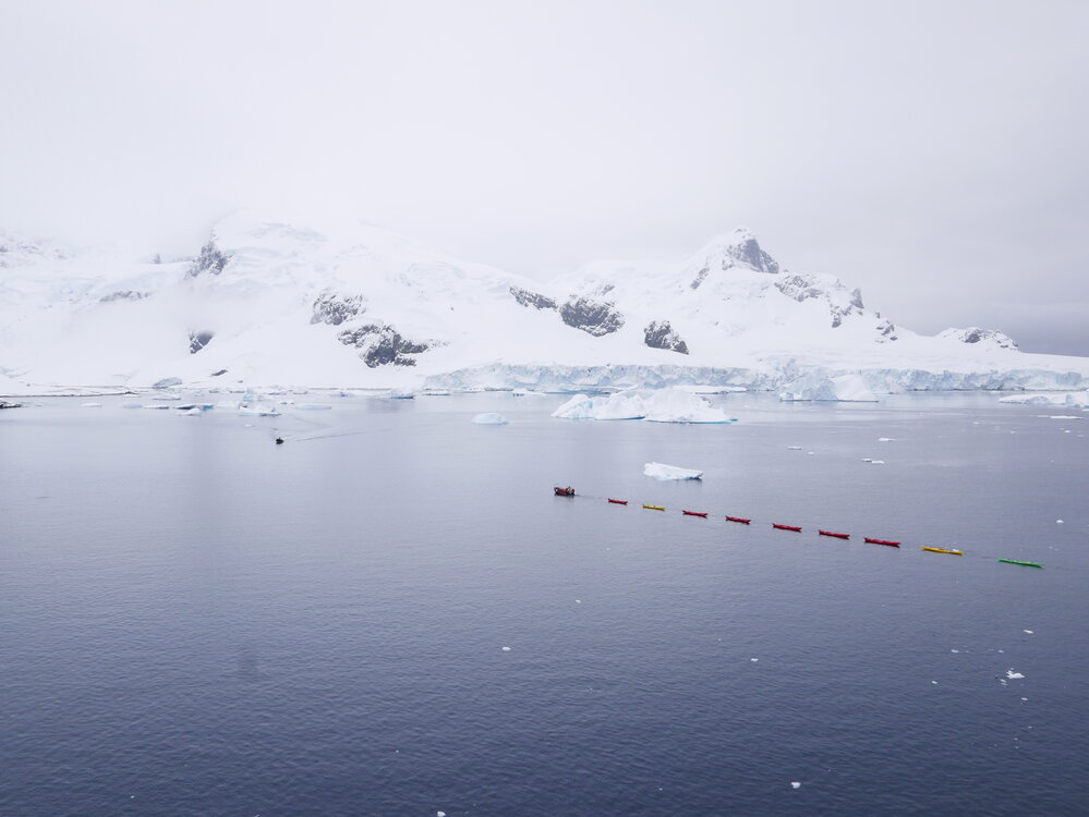 View of zodiac towing kayaks from the ship 'Ocean Endeavour ...